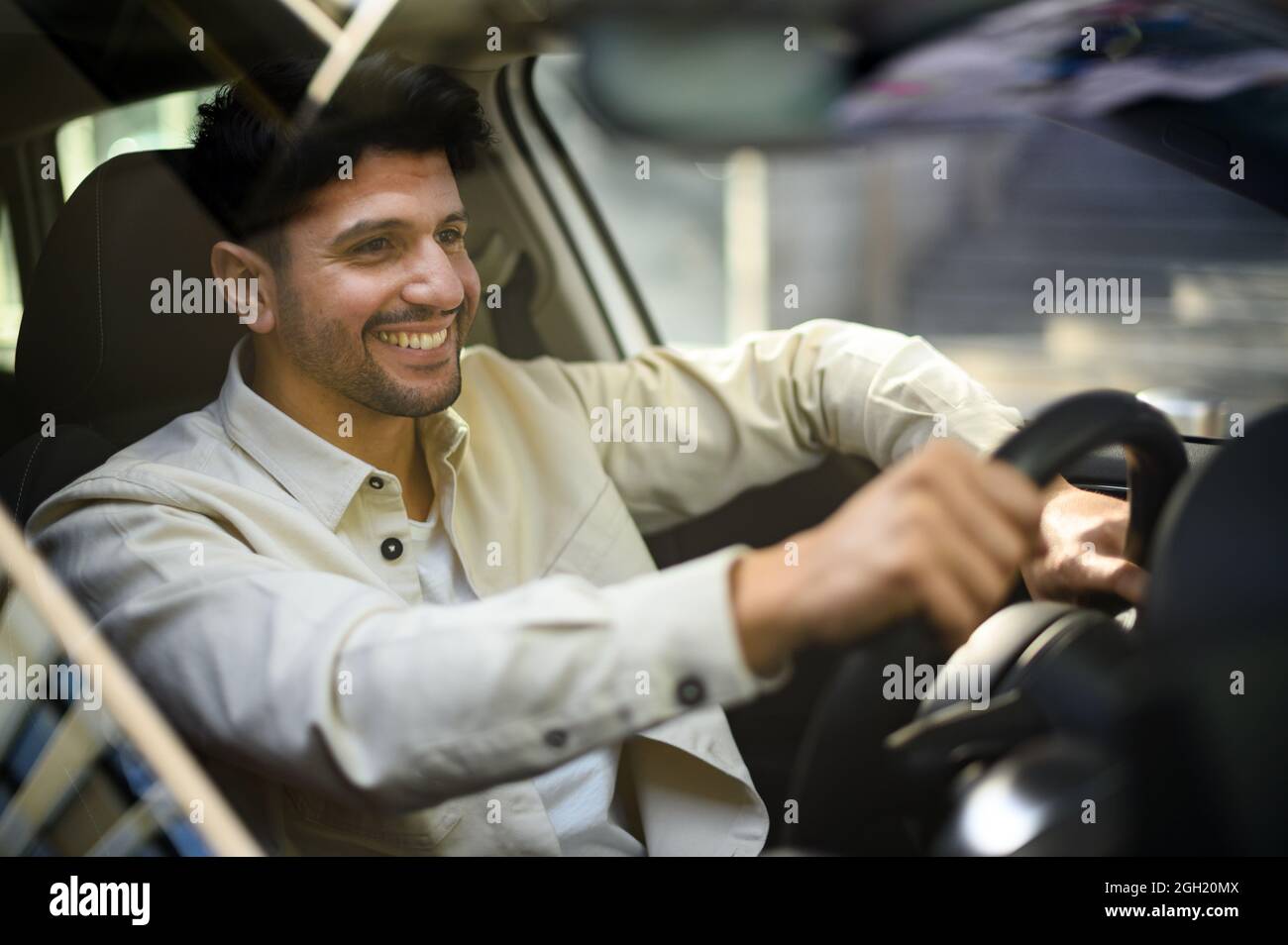 Young man driving sports car hi-res stock photography and images - Alamy