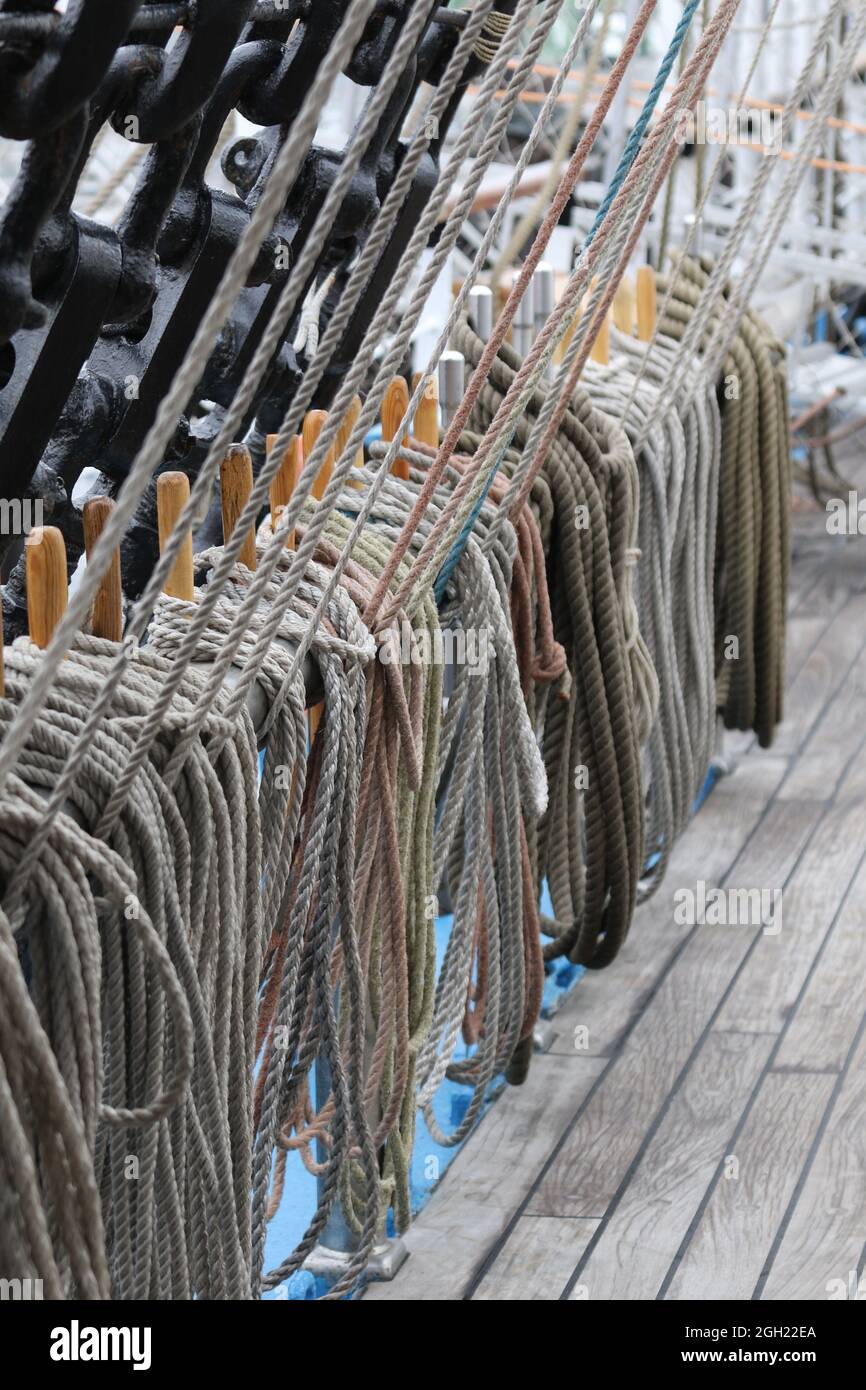Vertical shot of ropes of the sailing ship Stock Photo - Alamy
