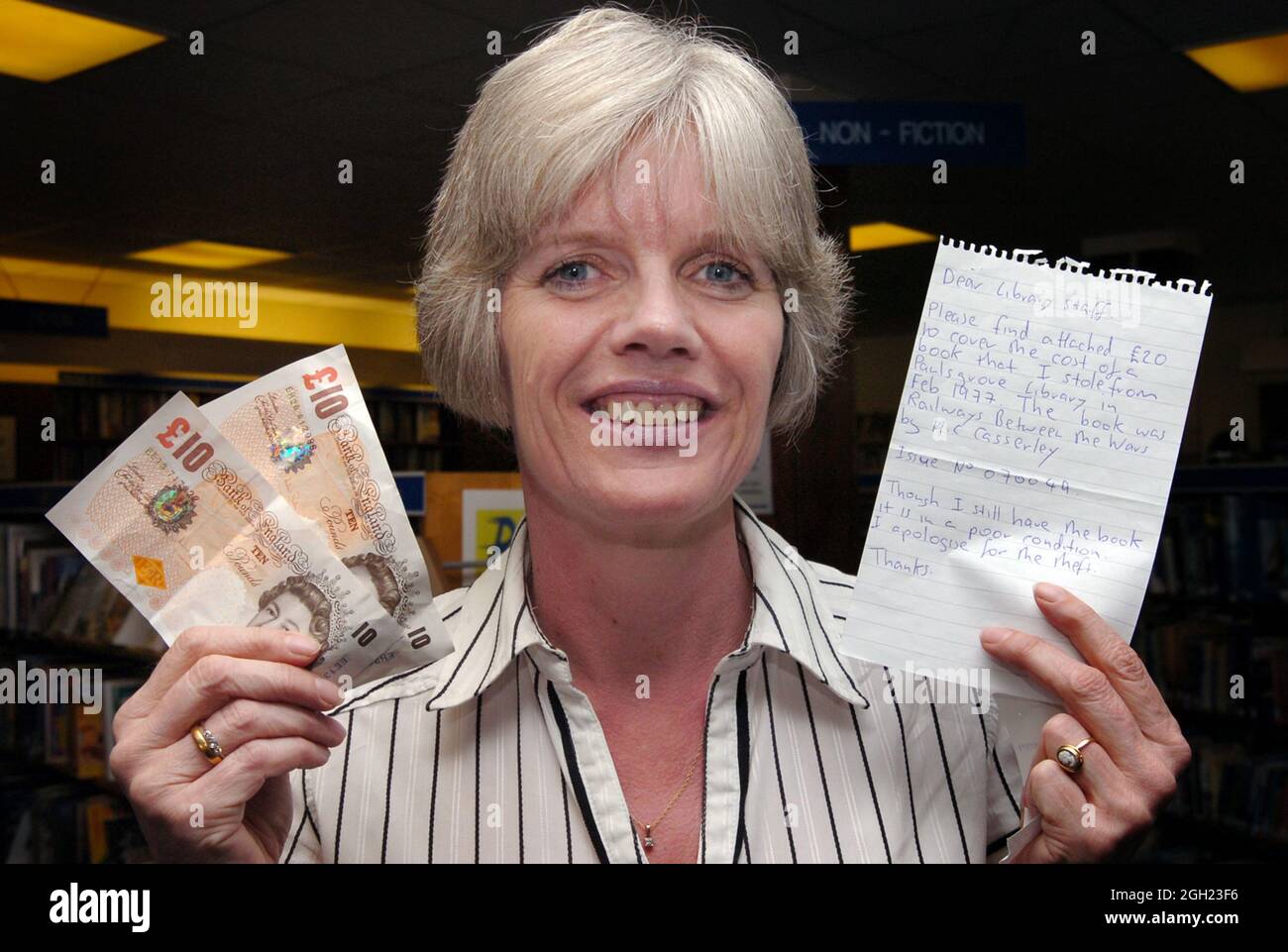 LIBRARIAN HELEN DEACON WITH THE £20 RETURNED BY A READER WHO STOLE A ...