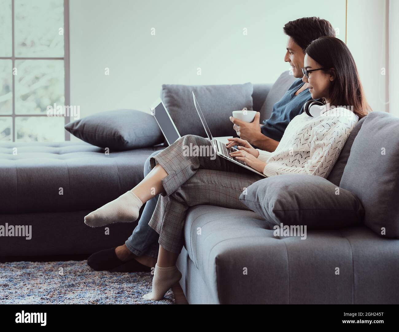 Mix race family lovers, Caucasian husband and Asian wife, sitting in ...