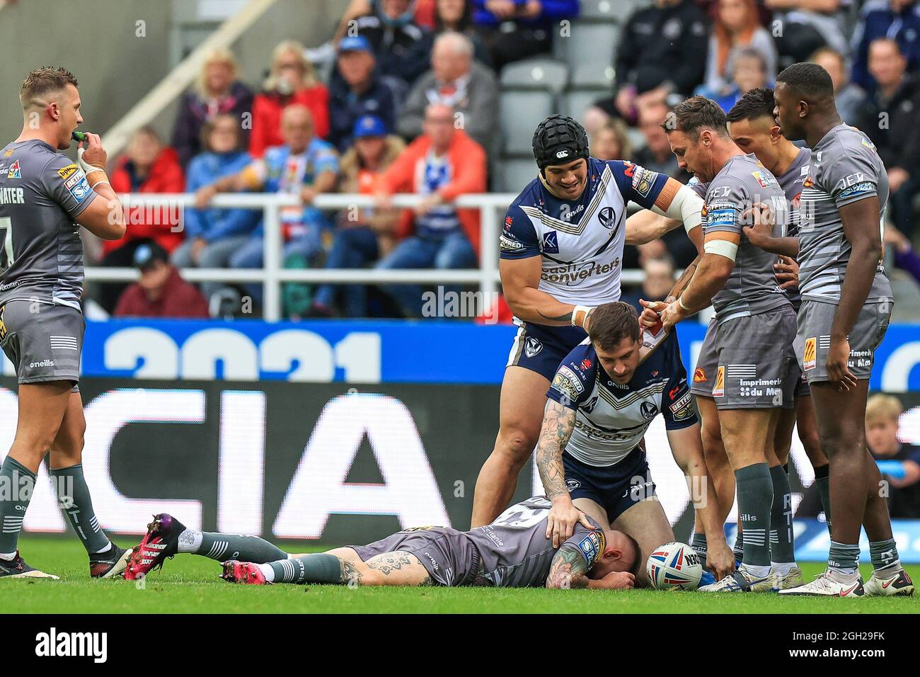 Sam Tomkins (29) of Catalans Dragons lies on the ground after a heavy ...