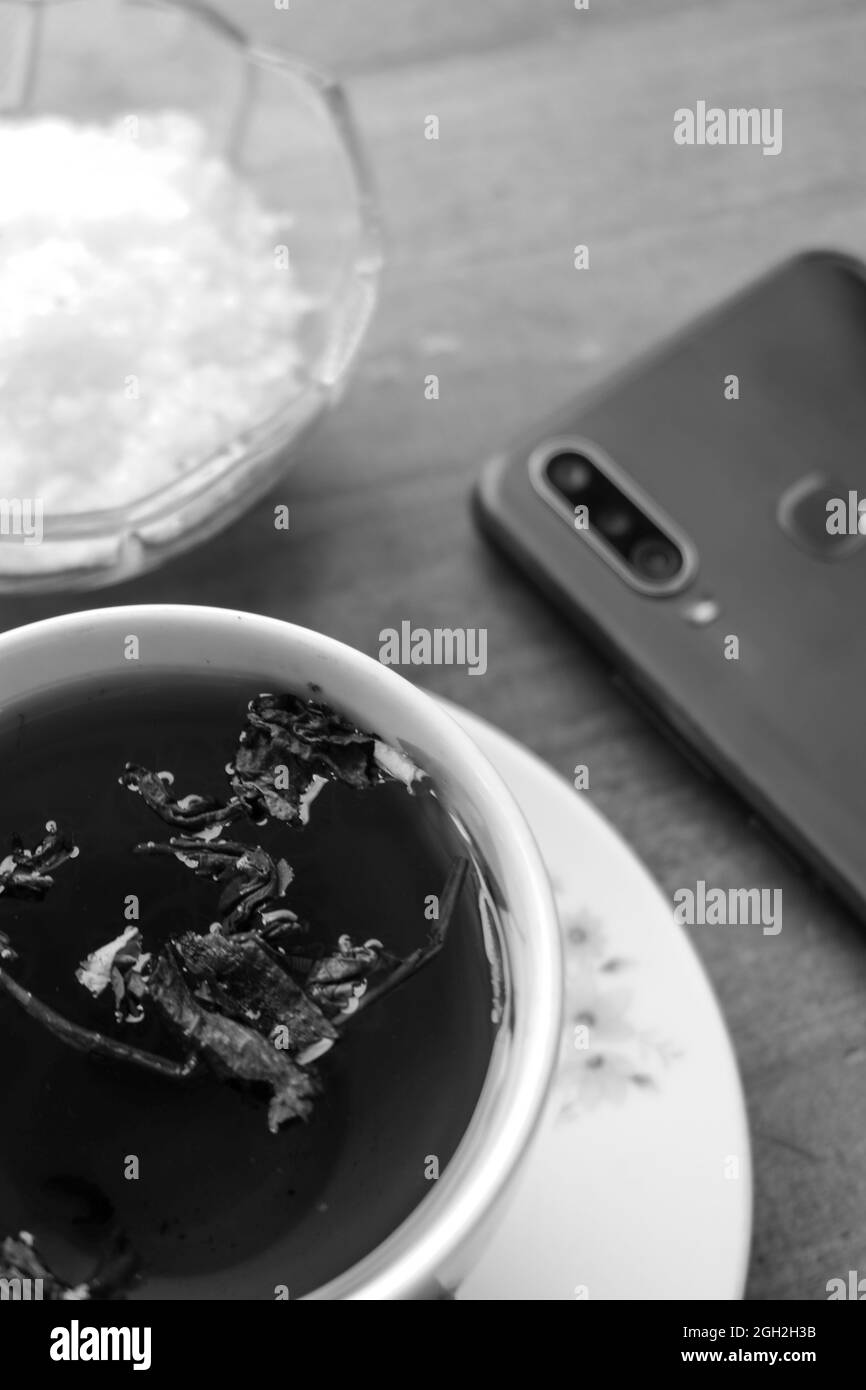 Mobile smartphone on dark Black and White Stock Photos & Images - Alamy