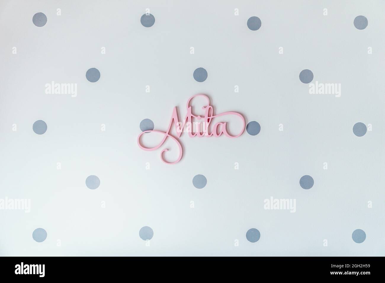 3d rendering of a background with dot patterns and a name Mila in pink ...