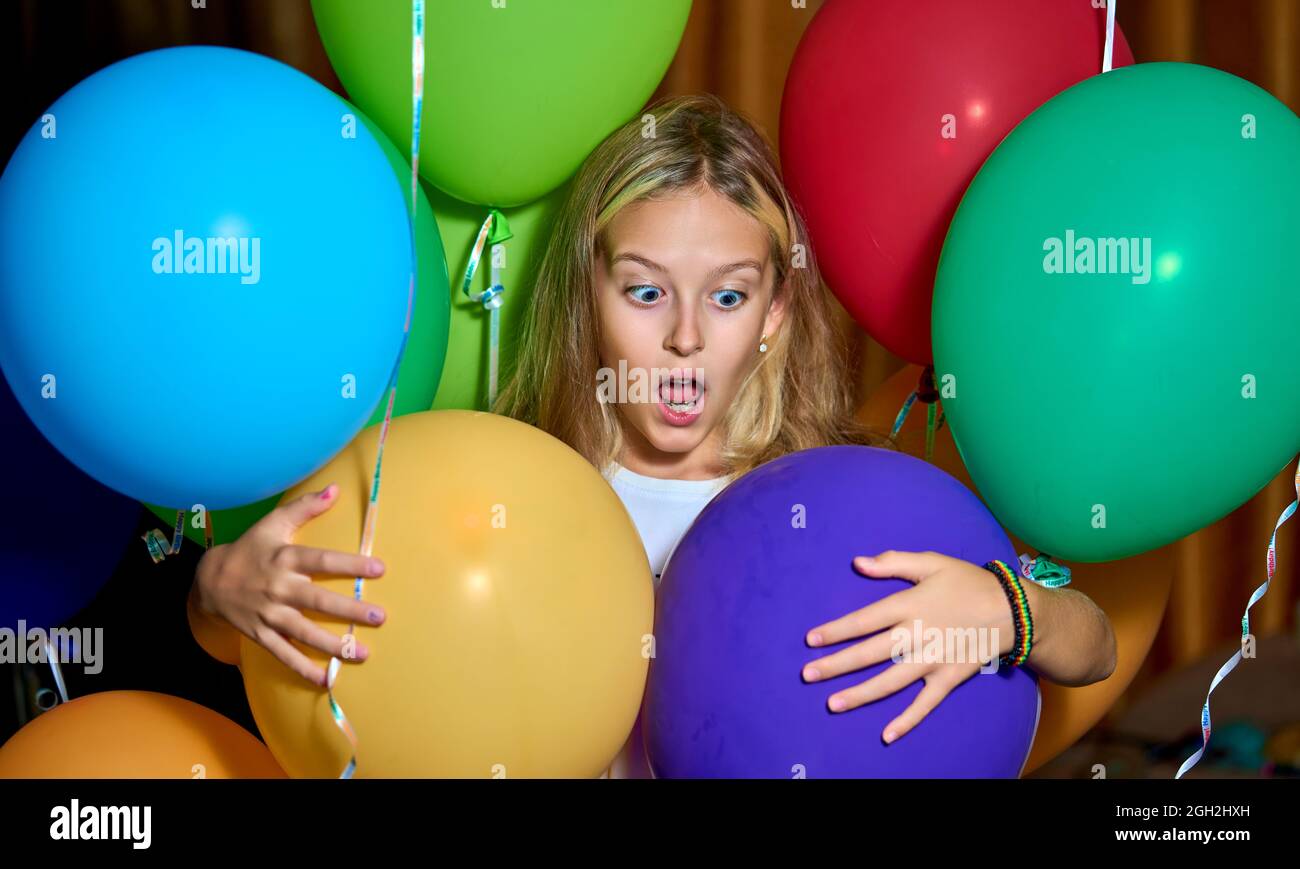 girl with bright inflatable balloons Stock Photo - Alamy