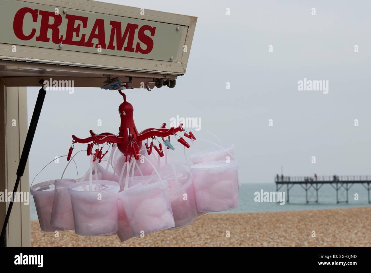 Candy floss seen hanging on display in front of a small shop on the ...