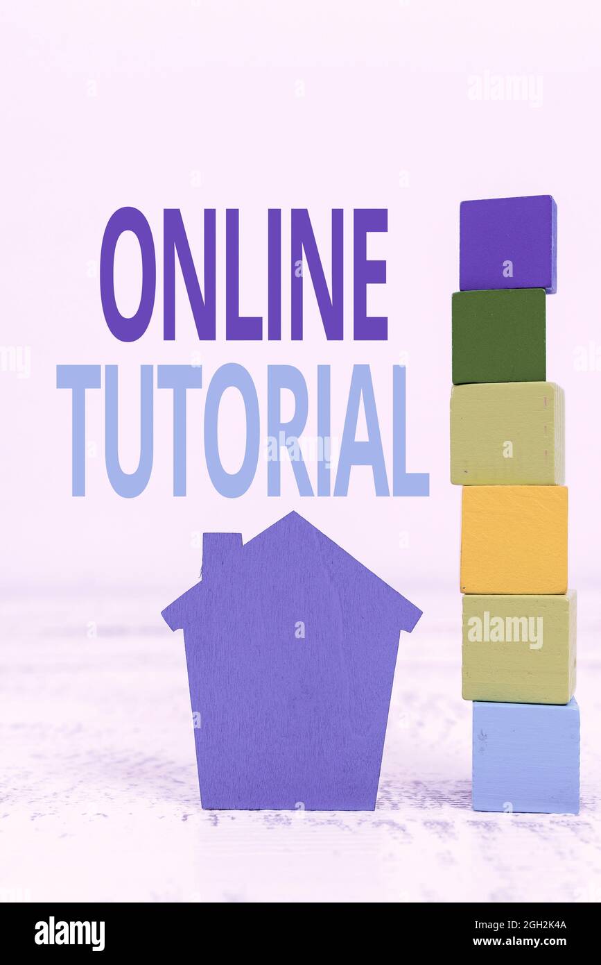 Hand writing sign Online Tutorial. Business concept process of tutoring ...