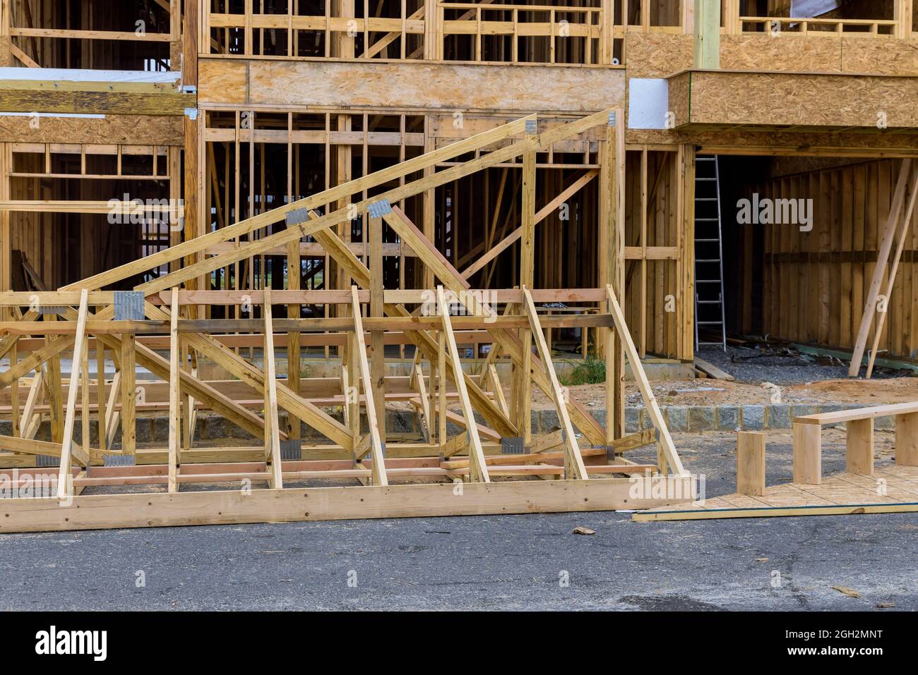 Wood building frame structure on a new development Stock Photo - Alamy