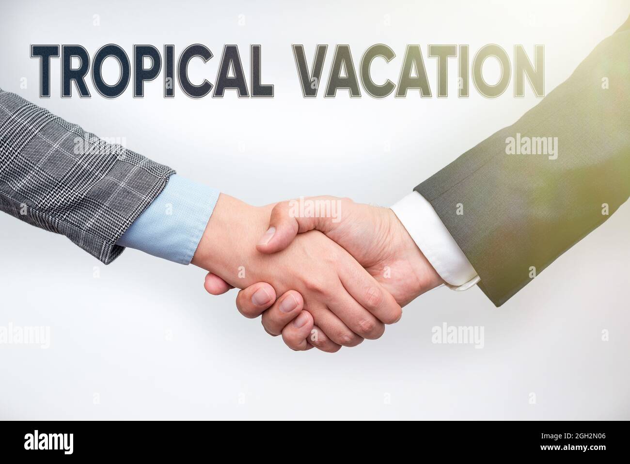 Hand writing sign Tropical Vacation. Word Written on taking a holiday ...