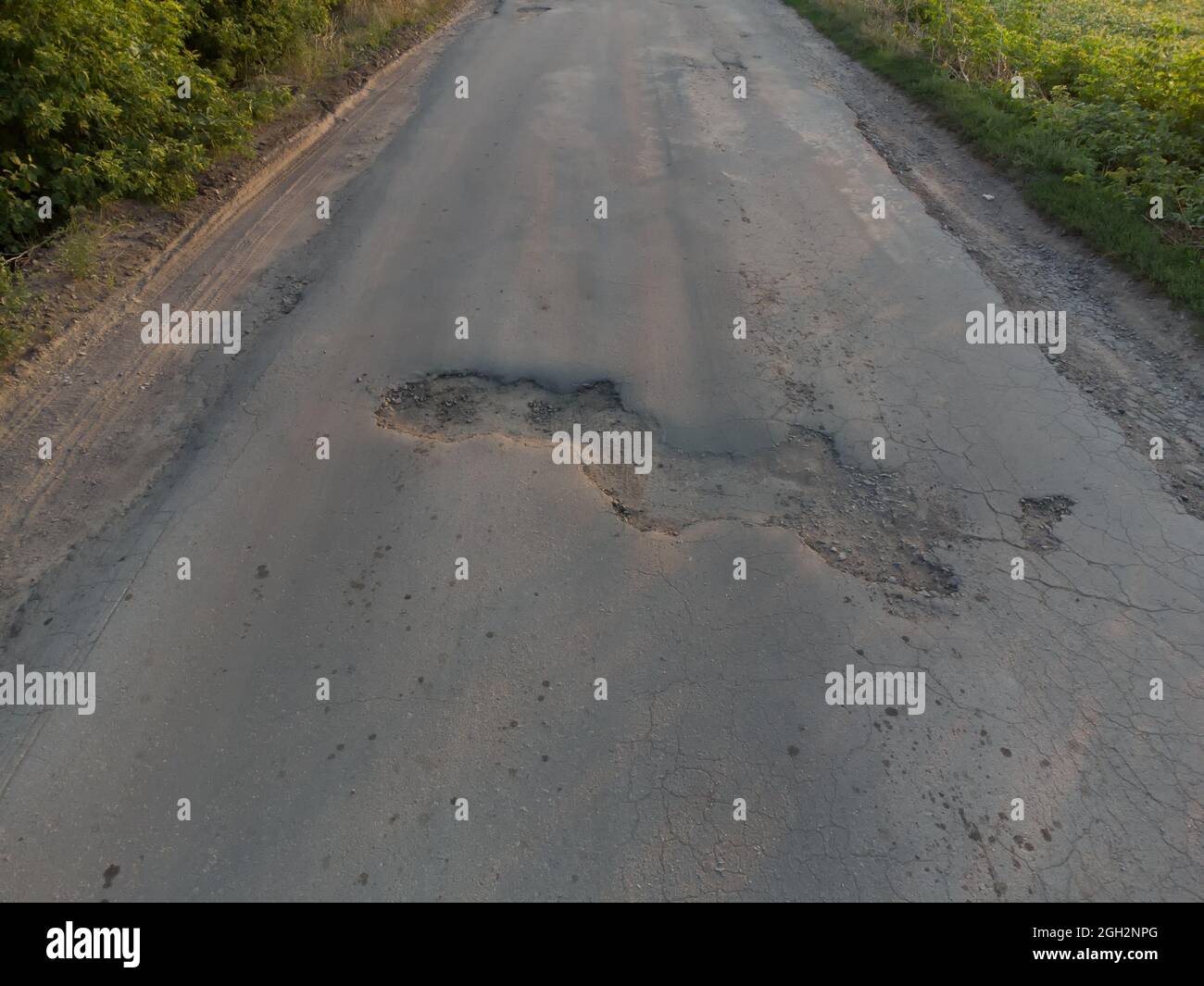 Broken road on the asphalt Stock Photo - Alamy