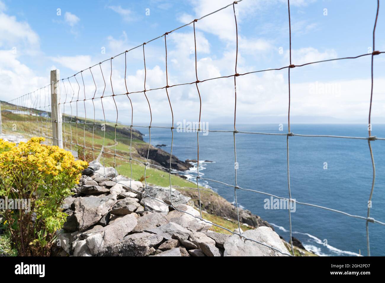 View through netting style fence for safety top of steep dramatic ...