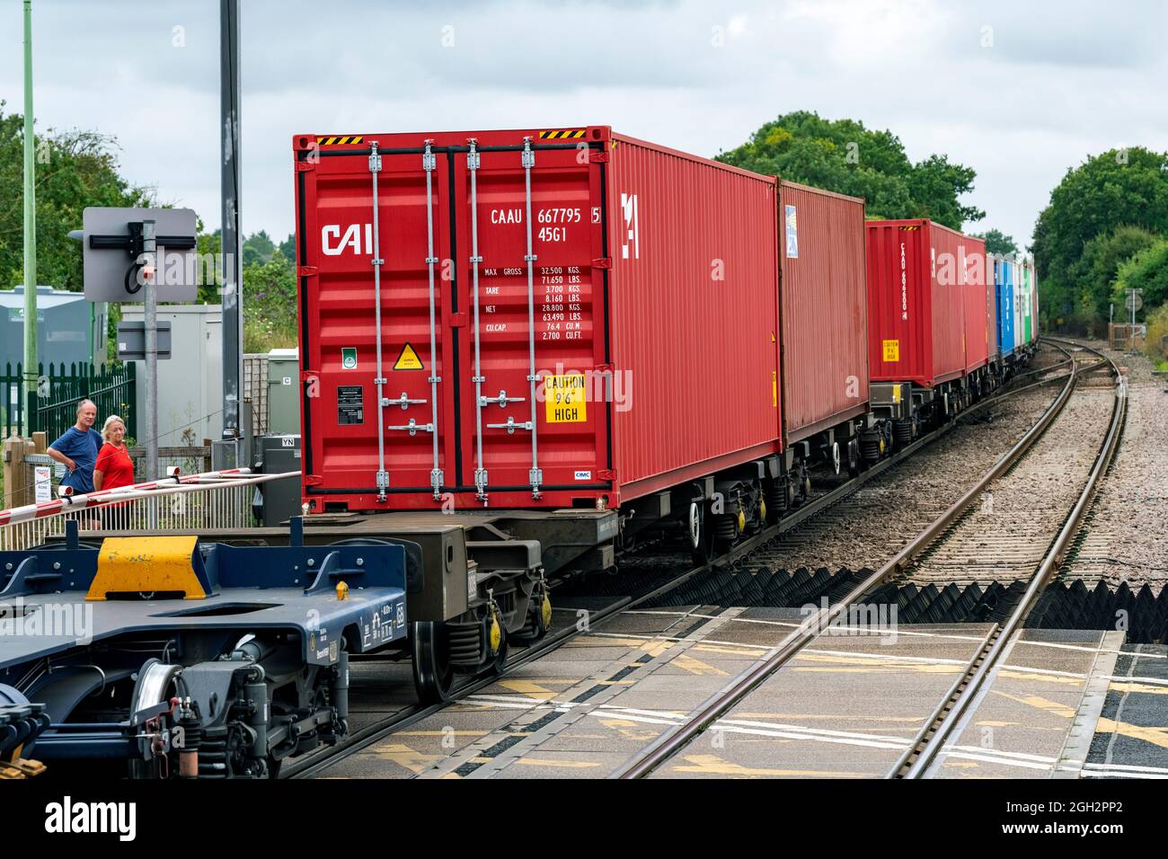 Freight train at a Level Crossing Westerfield Suffolk England Stock ...