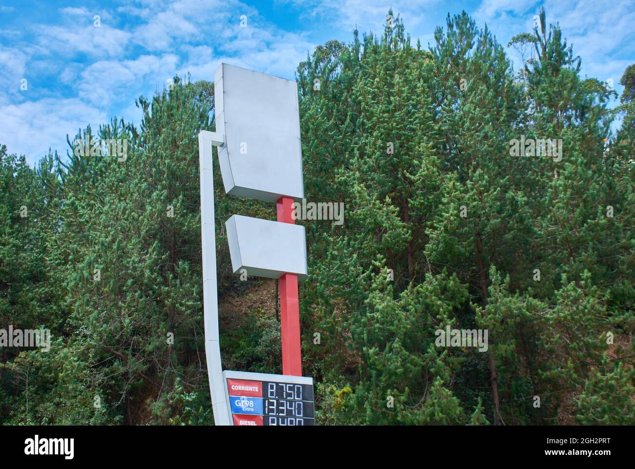 Exterior view of a gas station sign on a landscape background Stock ...