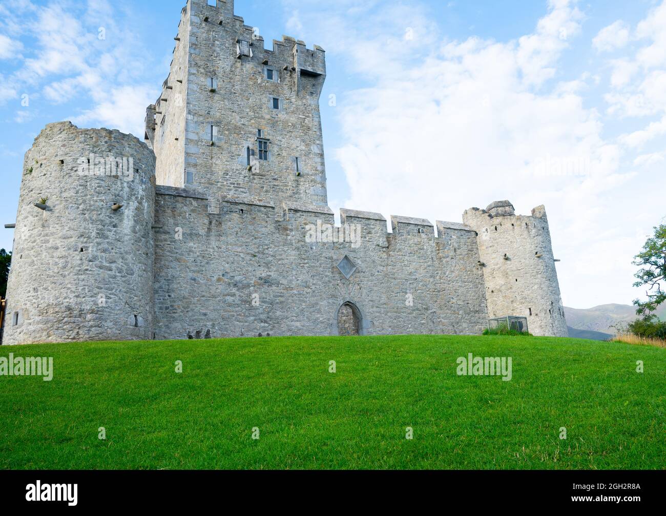 Ross Castle , medieval stone castle on small green rise in Killarney ...