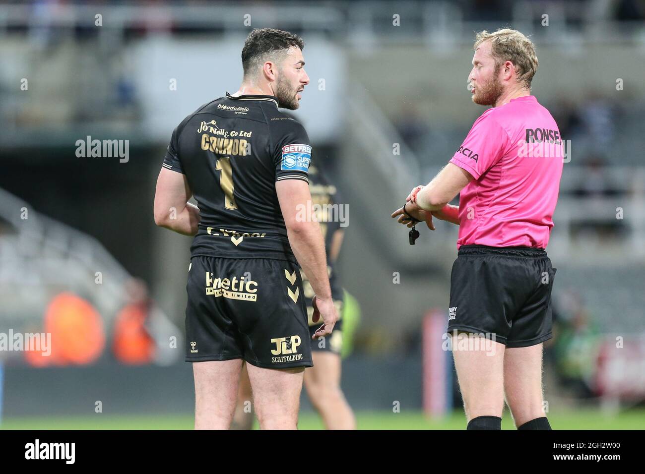Jake Connor (1) of Hull FC speaks to referee Robert Hicks just before ...