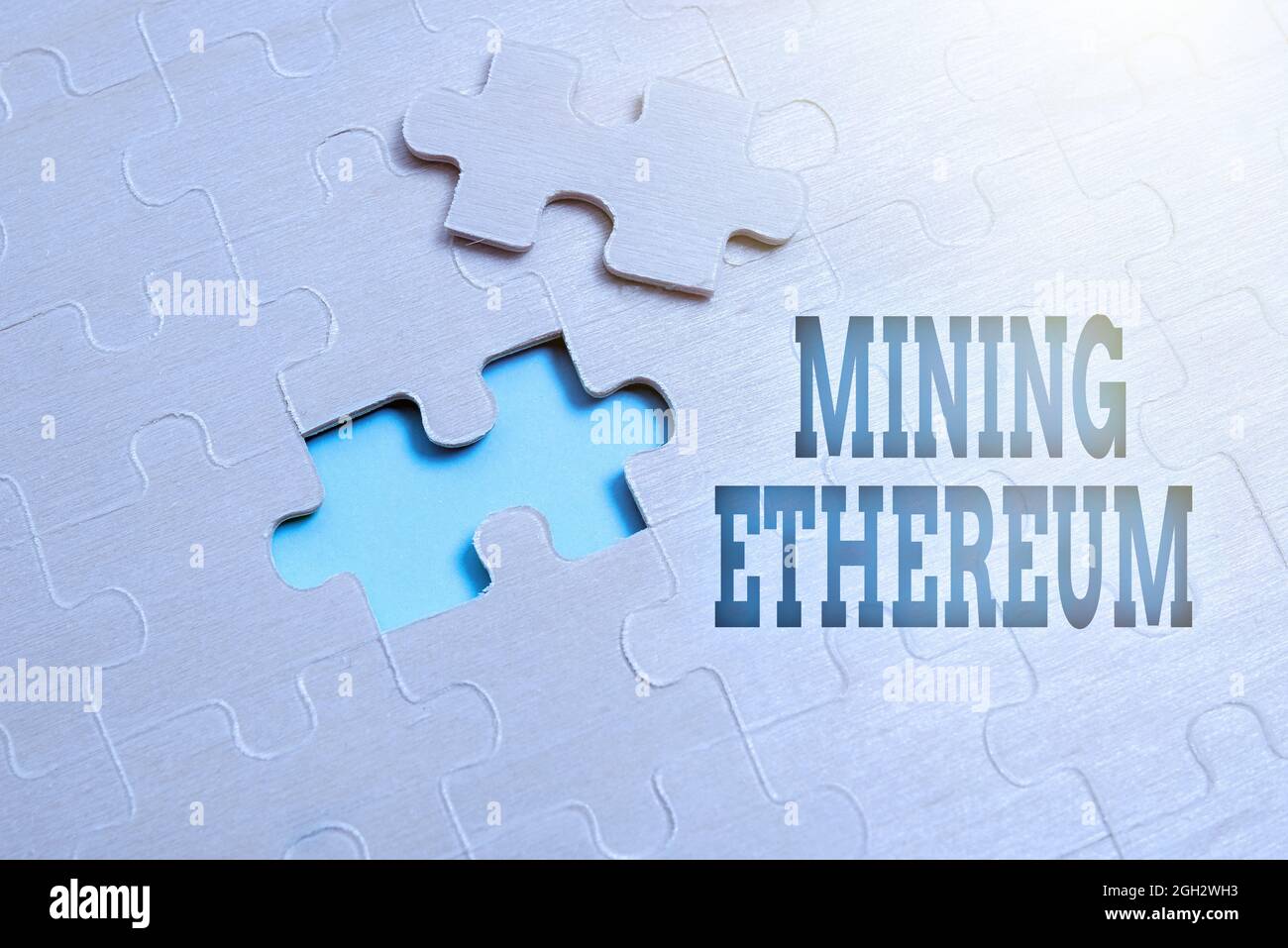 Hand writing sign Mining Ethereum. Conceptual photo the process of ...