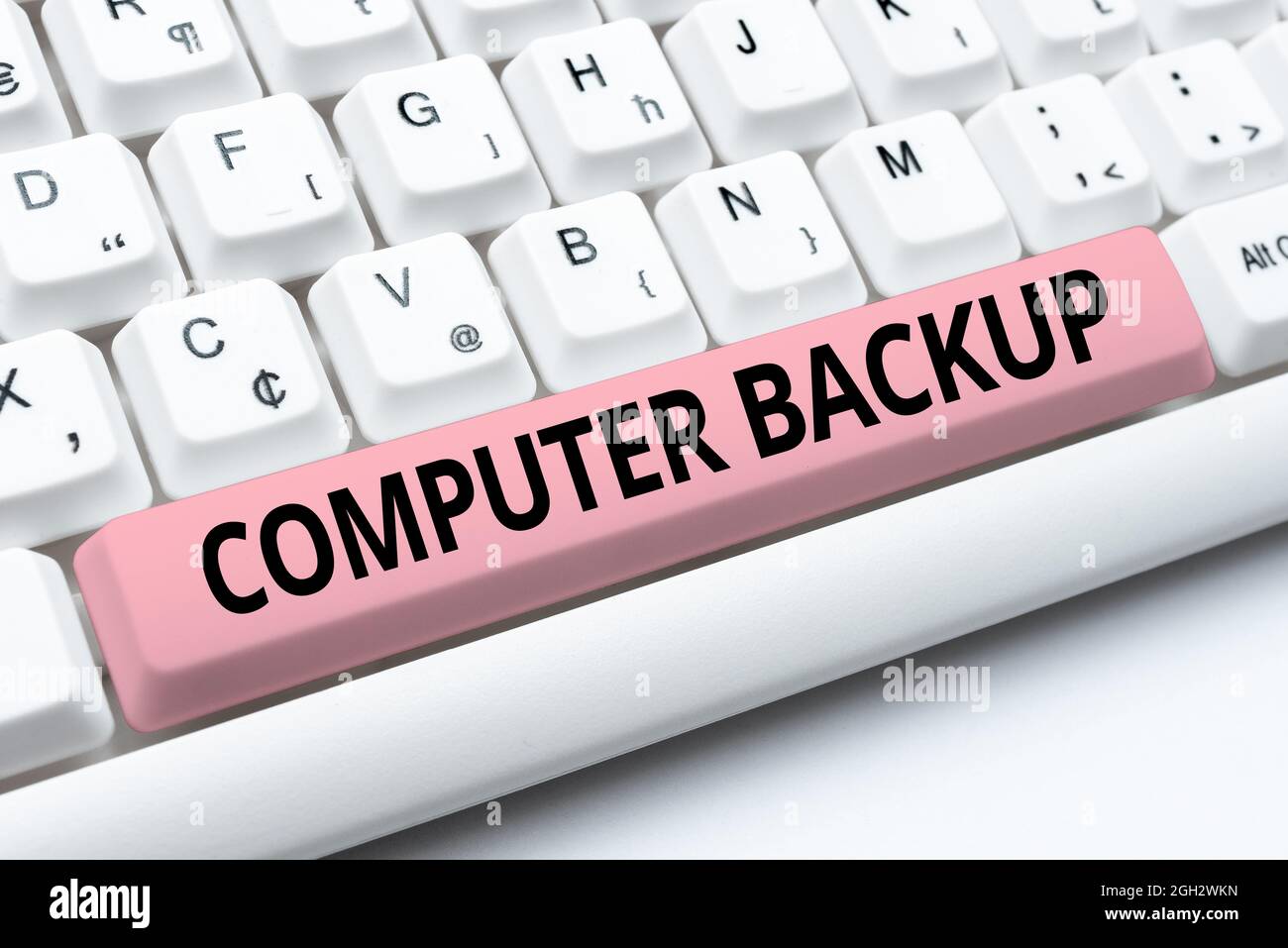 Text caption presenting Computer Backup. Word Written on the act of copying of files and data ...