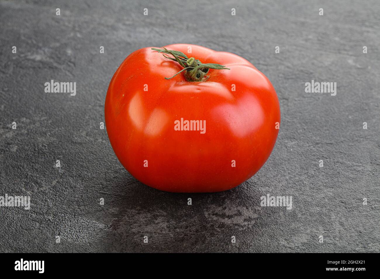 Red ripe big juicy tomato isolated Stock Photo - Alamy