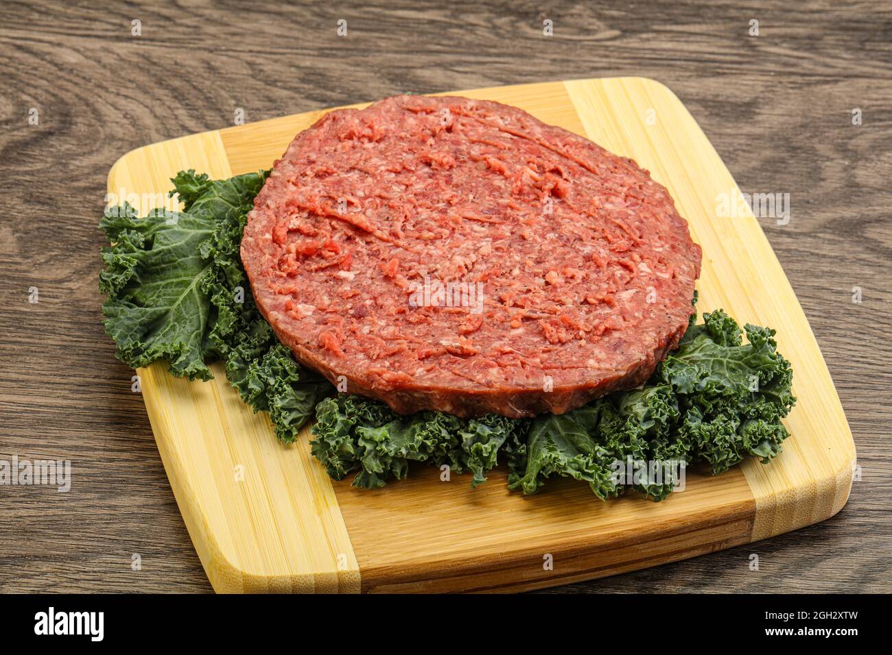 Raw beef burger cutlet for grill burger Stock Photo - Alamy
