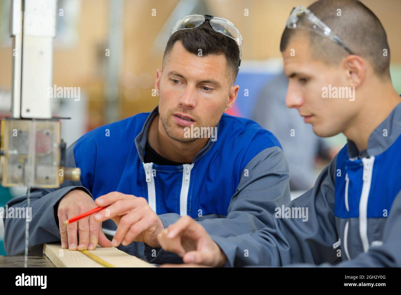 two carpenters are working together Stock Photo - Alamy