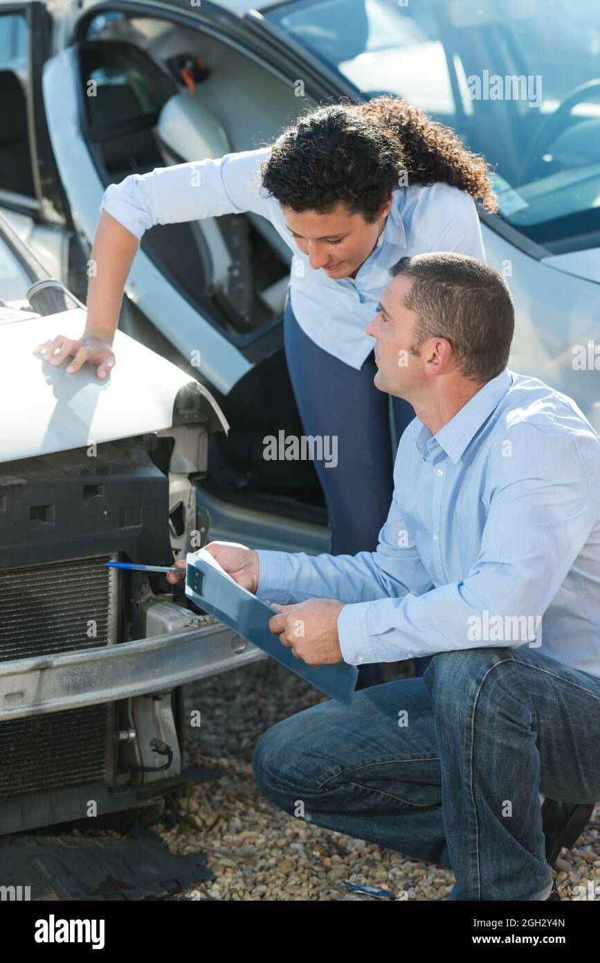 an engineering mechanic talking to customer Stock Photo - Alamy