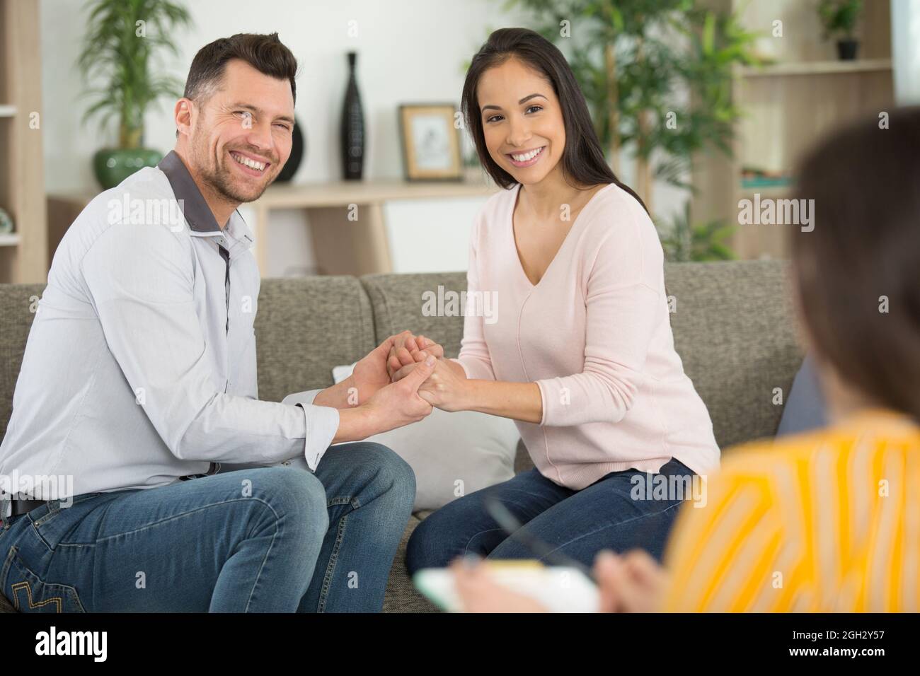 happy couple at psychologist Stock Photo - Alamy