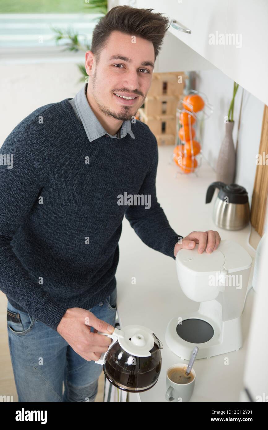 man making coffee at home Stock Photo - Alamy