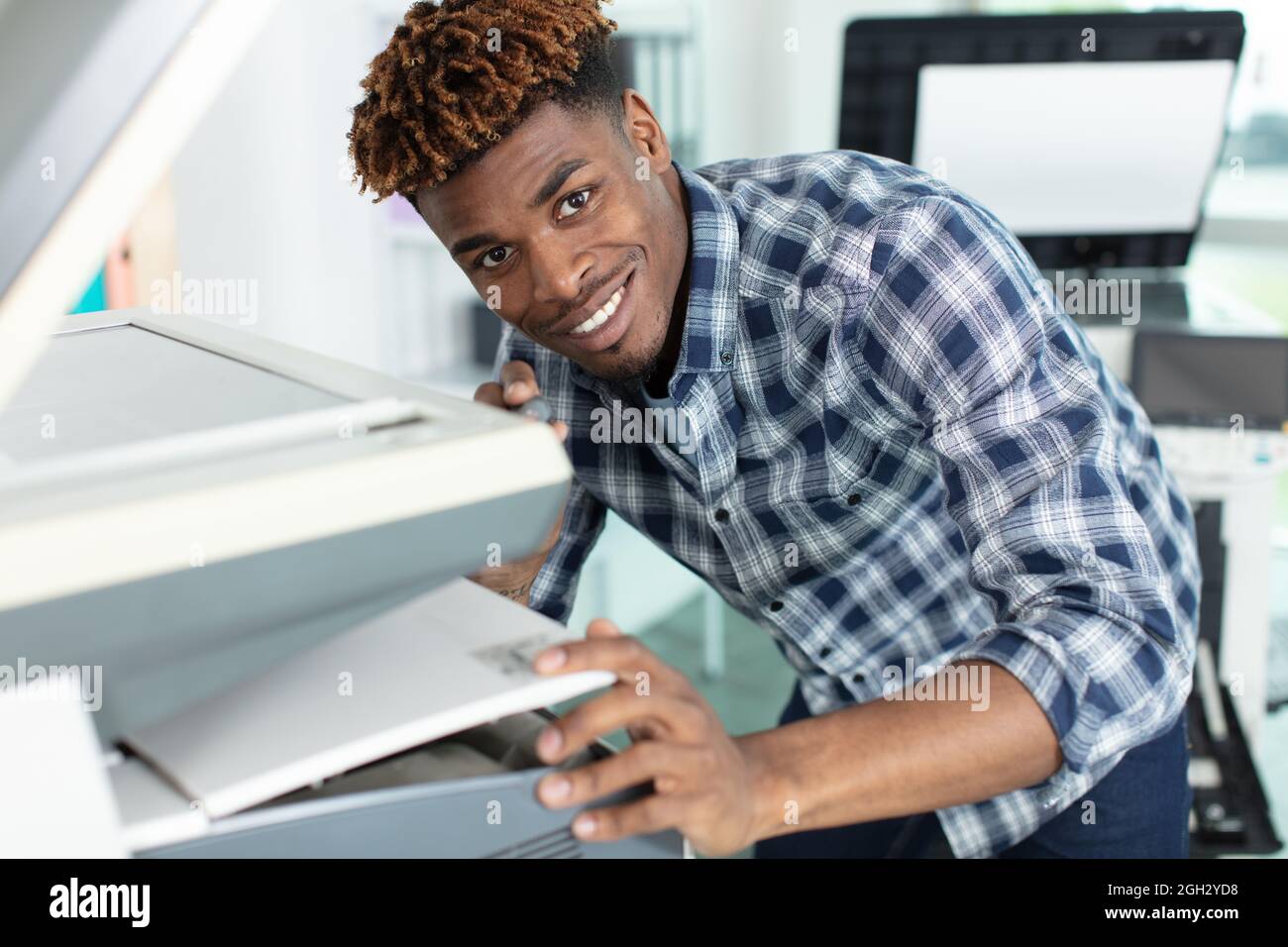 Male businessman fax machine copier hi-res stock photography and images ...