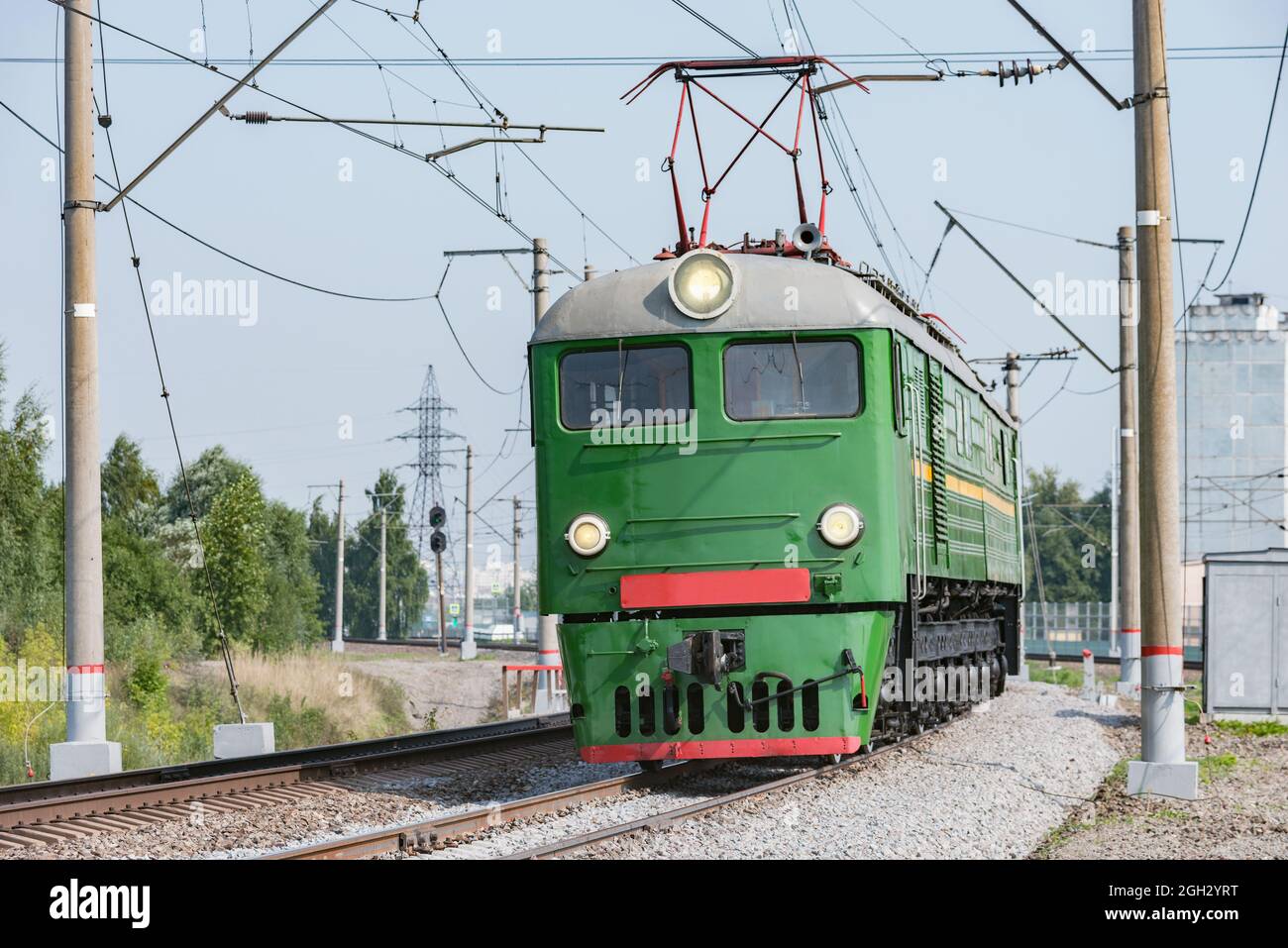 Freight retro electric locomotive moves at day time Stock Photo - Alamy