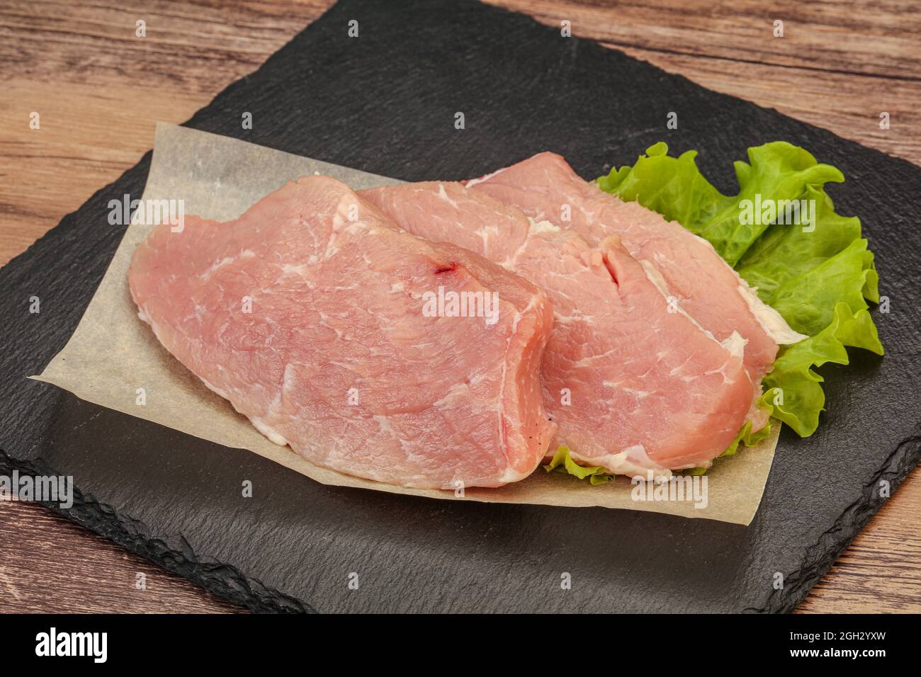 Raw pork steak ready for cooking Stock Photo - Alamy