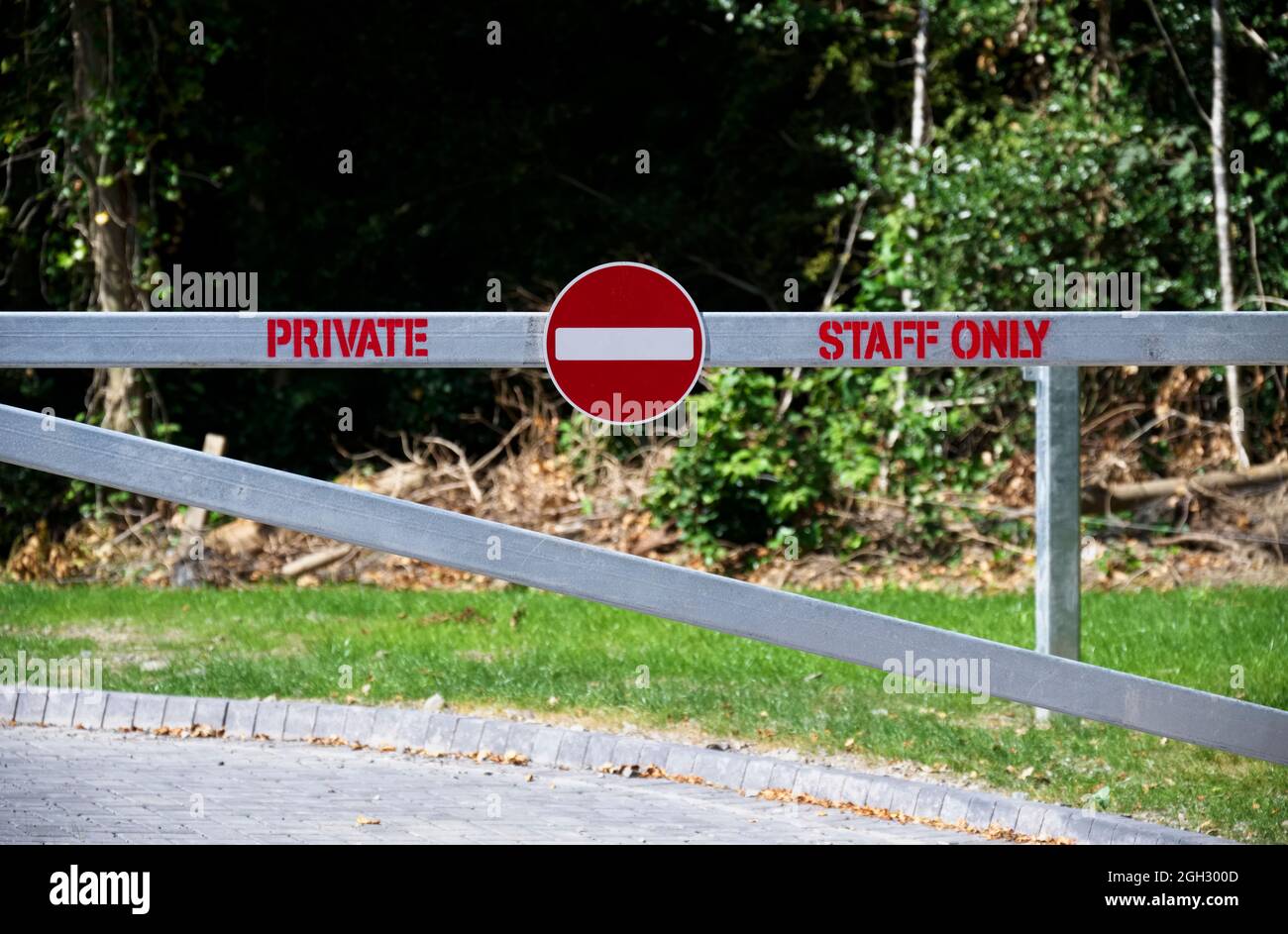 Staff entrance sign on private gate at workplace Stock Photo - Alamy