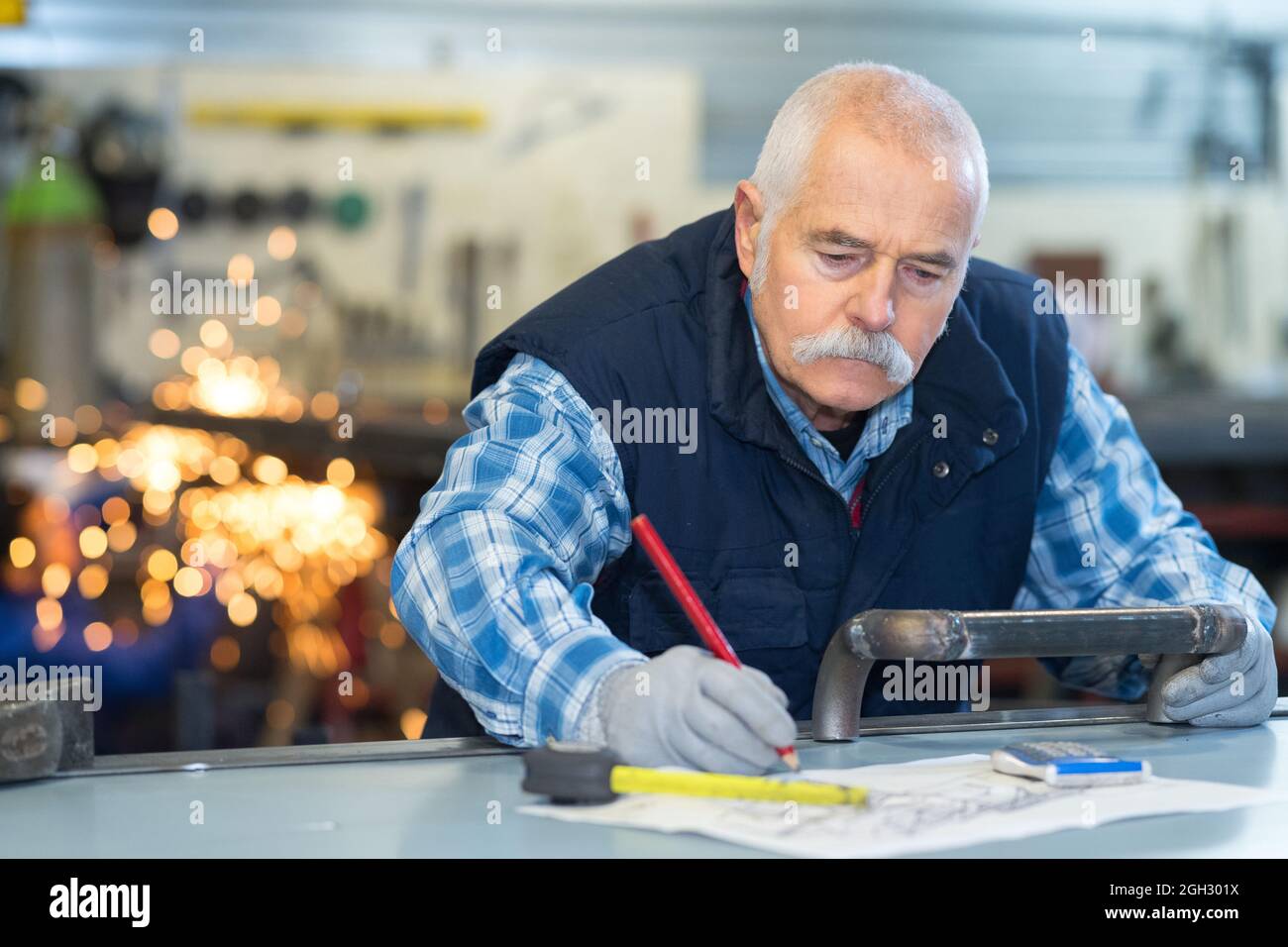 Welder repairing technical equipment hi-res stock photography and ...