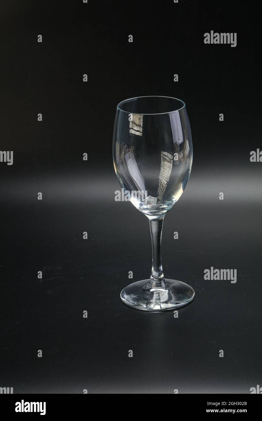 Empty glass for vine or water isolated Stock Photo - Alamy