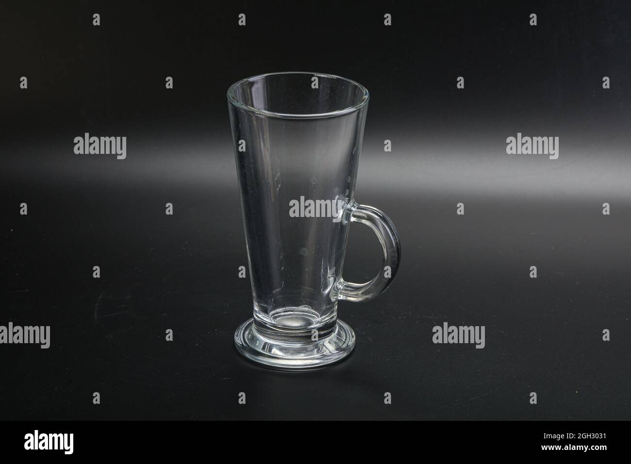 Empty glass cup for drinks isolated Stock Photo - Alamy