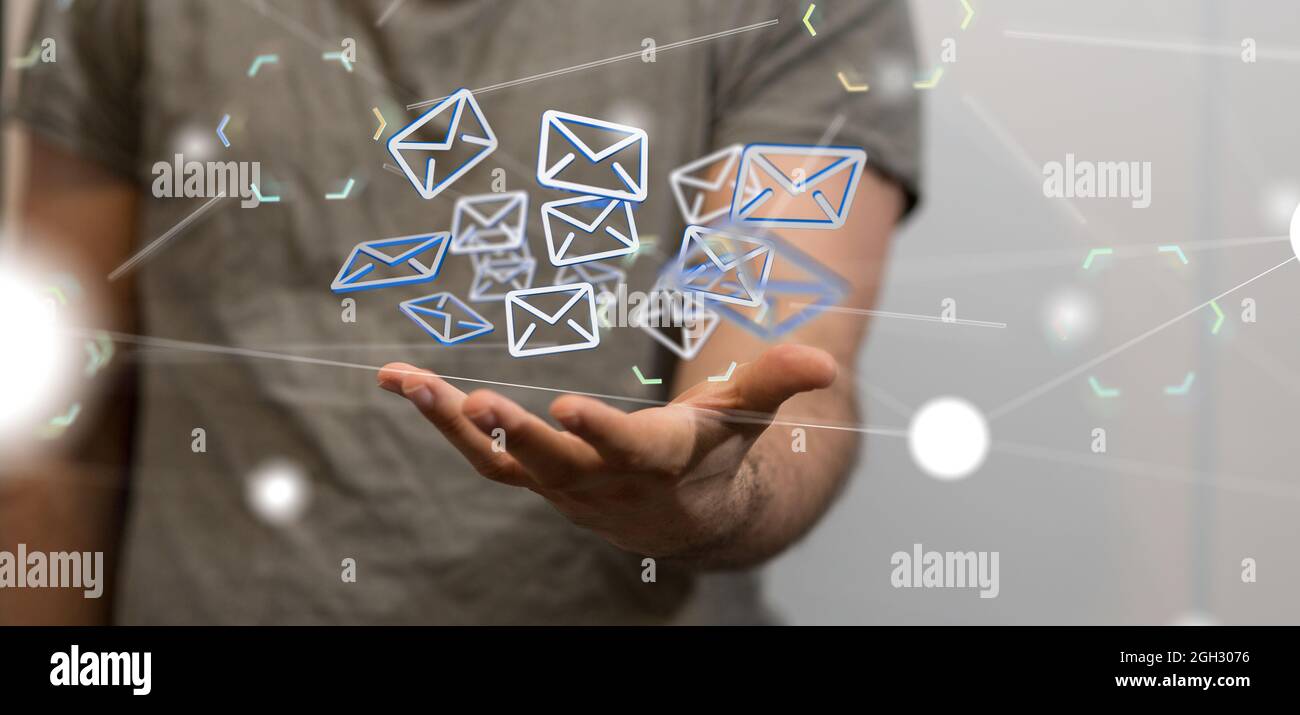 Illustration of email icons in a hand for communication Stock Photo - Alamy