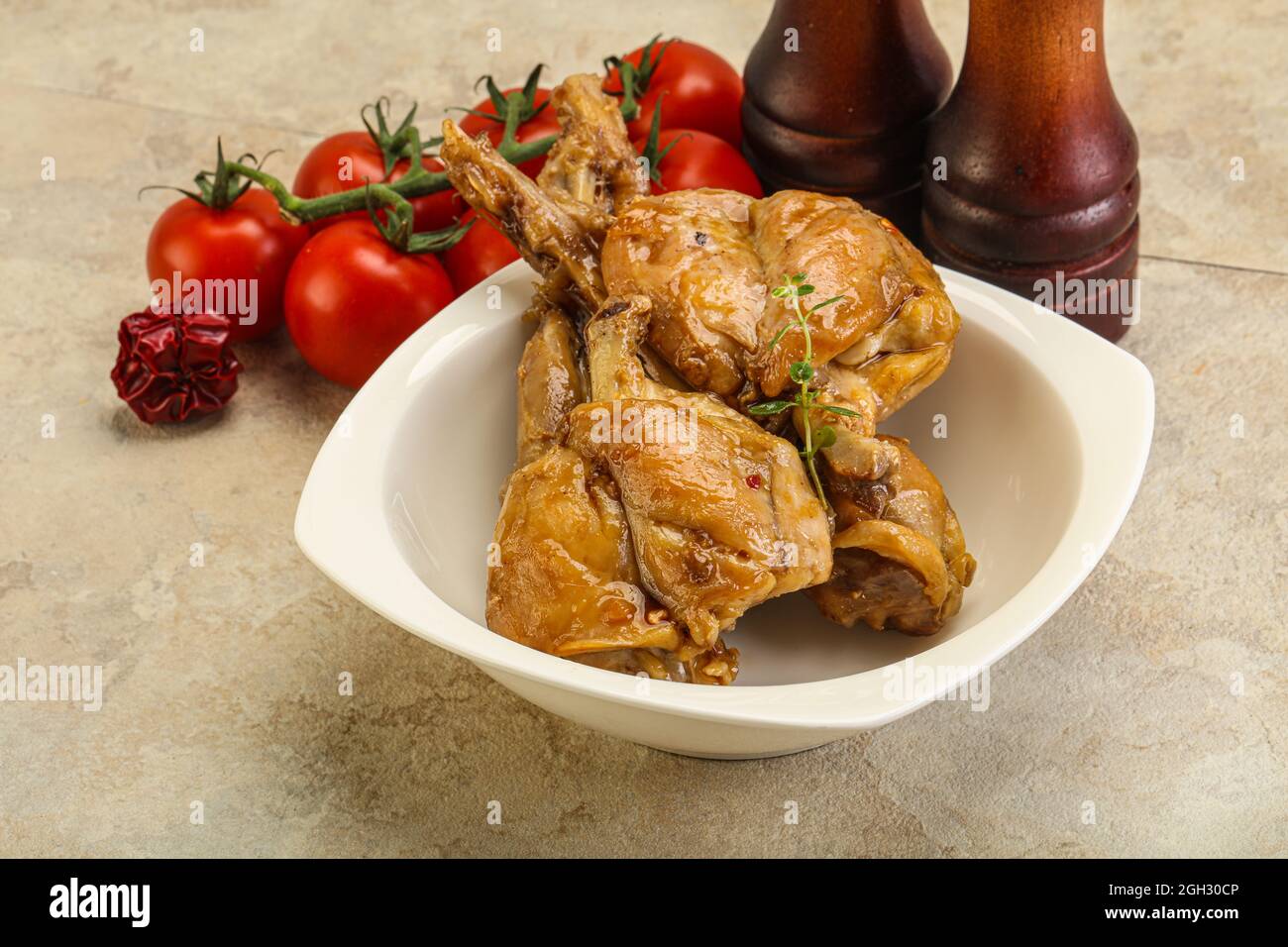 Rabbit stew in sweet and spicy sauce Stock Photo - Alamy
