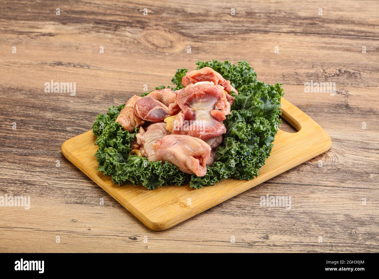 Raw tasty chicken stomach for cooking Stock Photo - Alamy