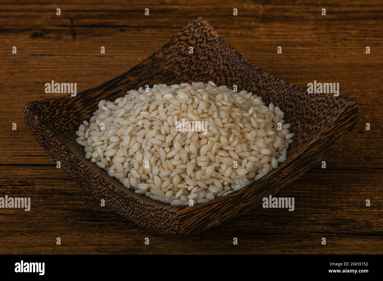 Raw Italian arborio rice for Risotto Stock Photo - Alamy