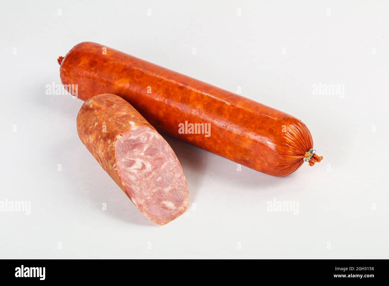 Delicous Pork ham sausage cut isolated Stock Photo - Alamy