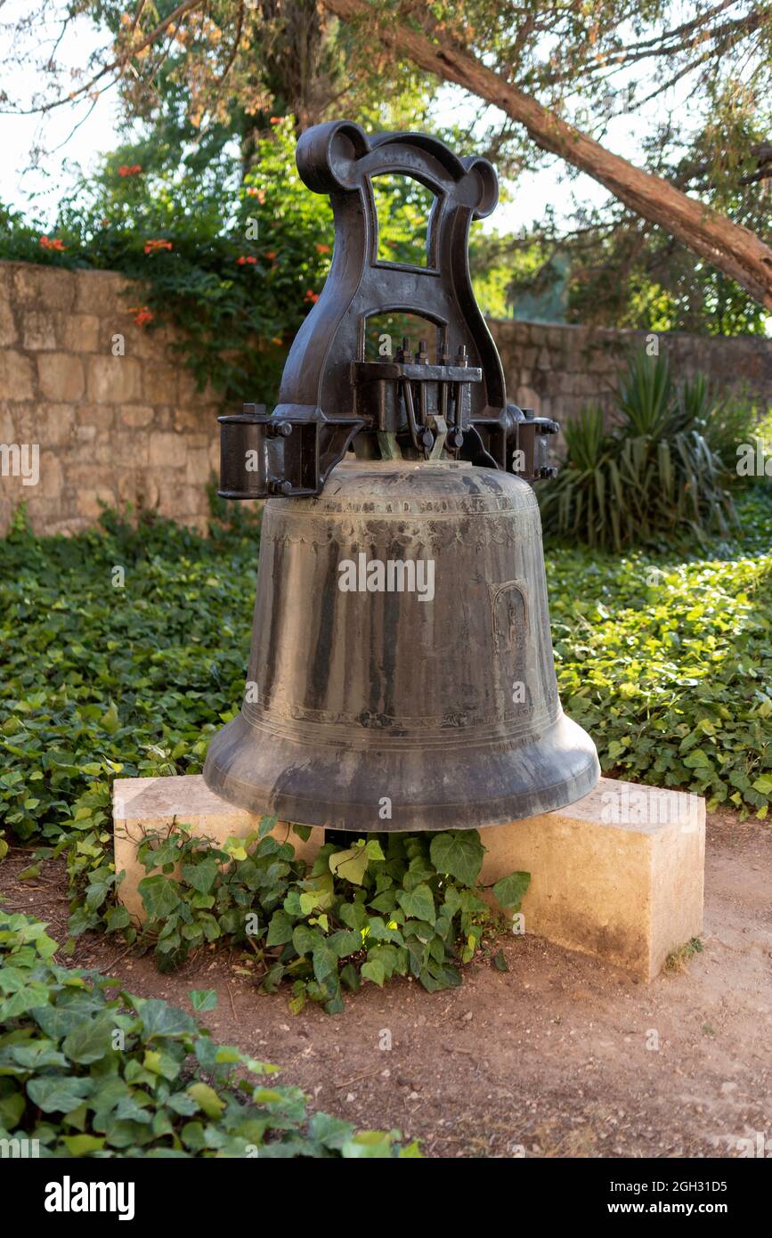 old bell exposed in garden Stock Photo - Alamy