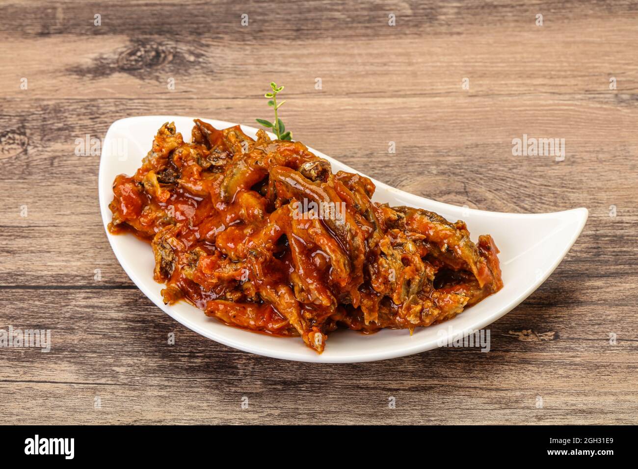 Canned anchovy snack in tomato sauce Stock Photo - Alamy