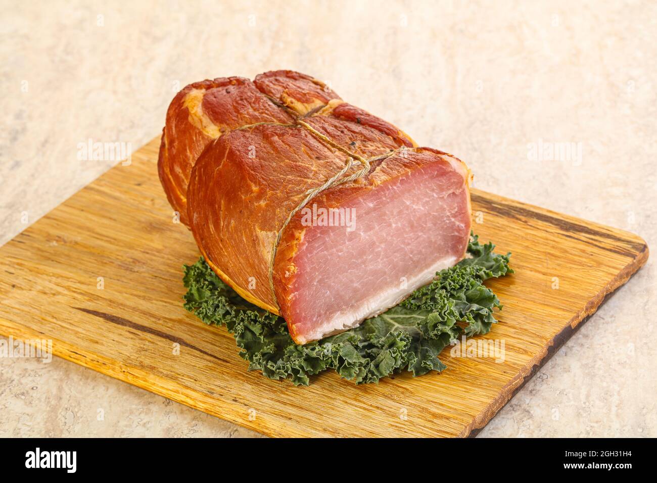 Delicous pork cured meat isolated over board Stock Photo - Alamy