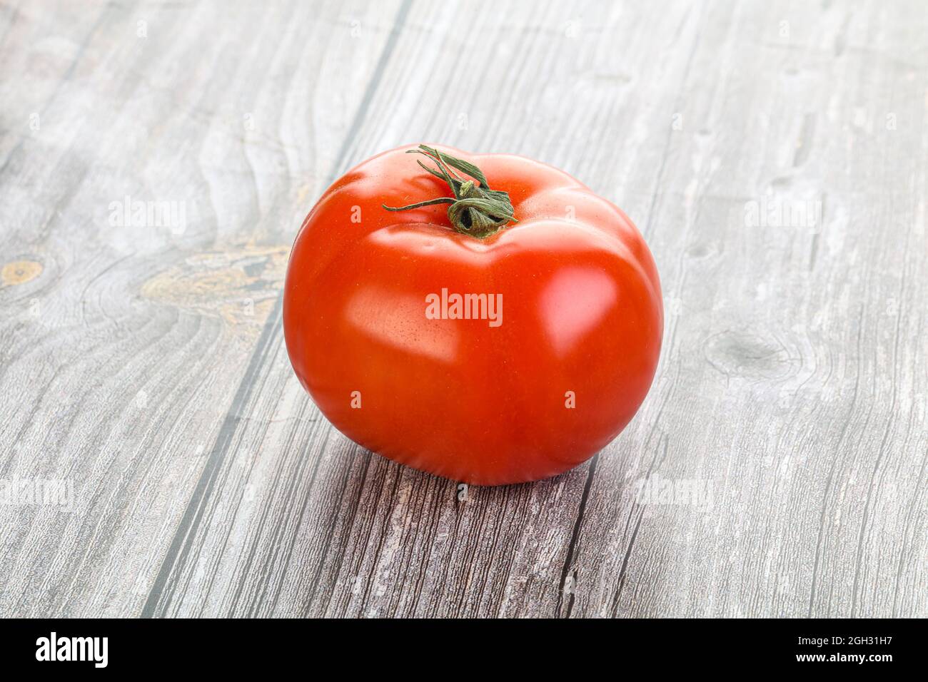 Red ripe big juicy tomato isolated Stock Photo - Alamy