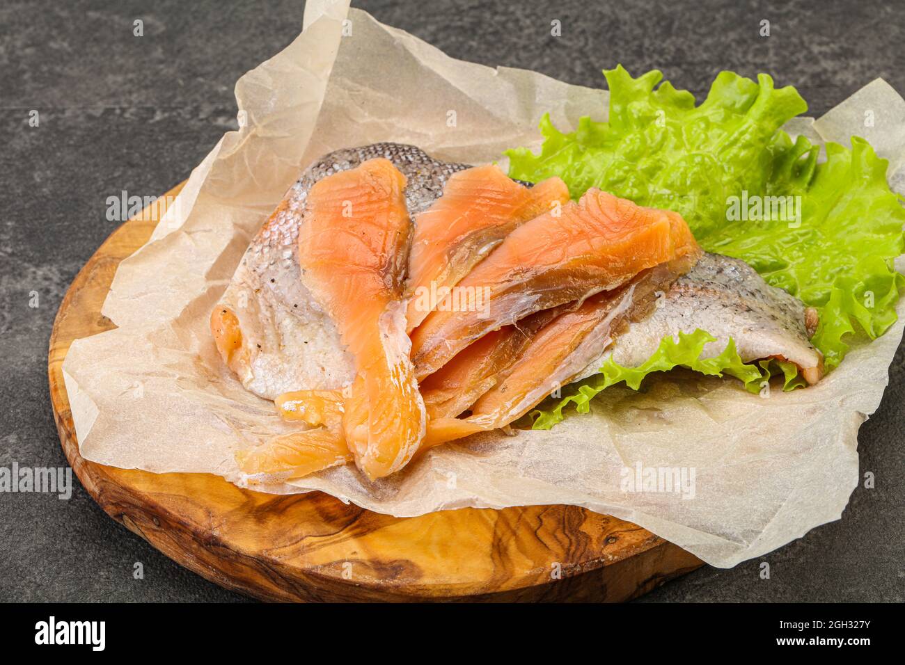 Sliced natural wild trout fillet over board Stock Photo - Alamy