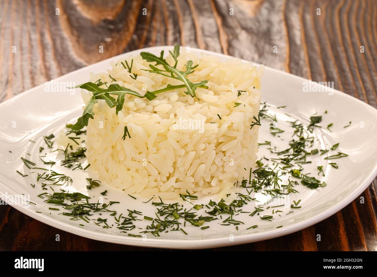 Steamed rice served green herbs in the plate Stock Photo - Alamy