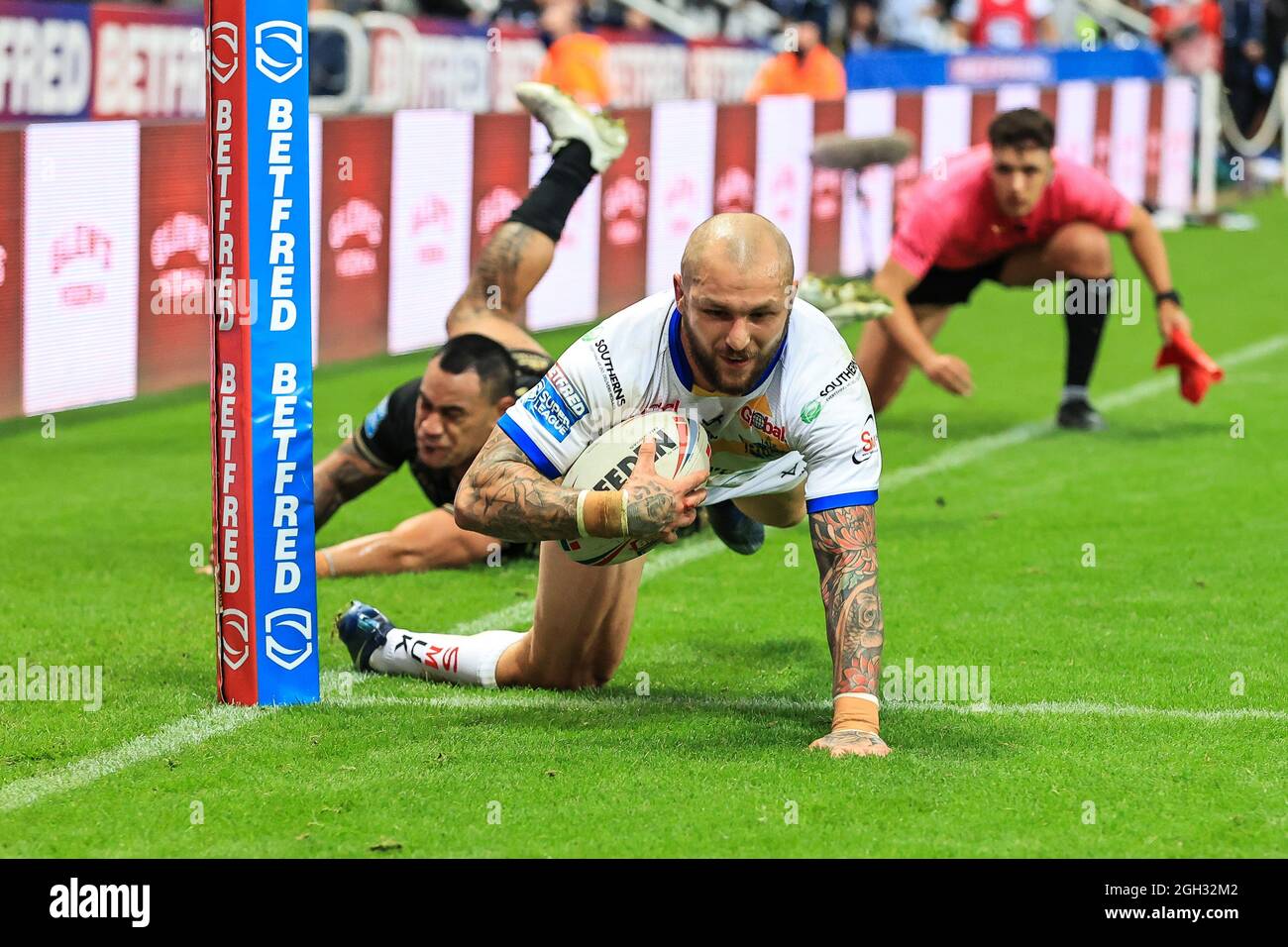 Luke Briscoe (24) of Leeds Rhinos puts his foot over the side line as ...