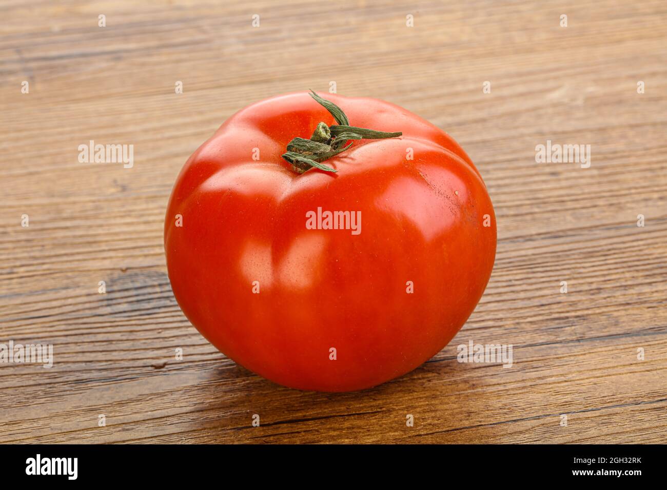 Red ripe big juicy tomato isolated Stock Photo - Alamy