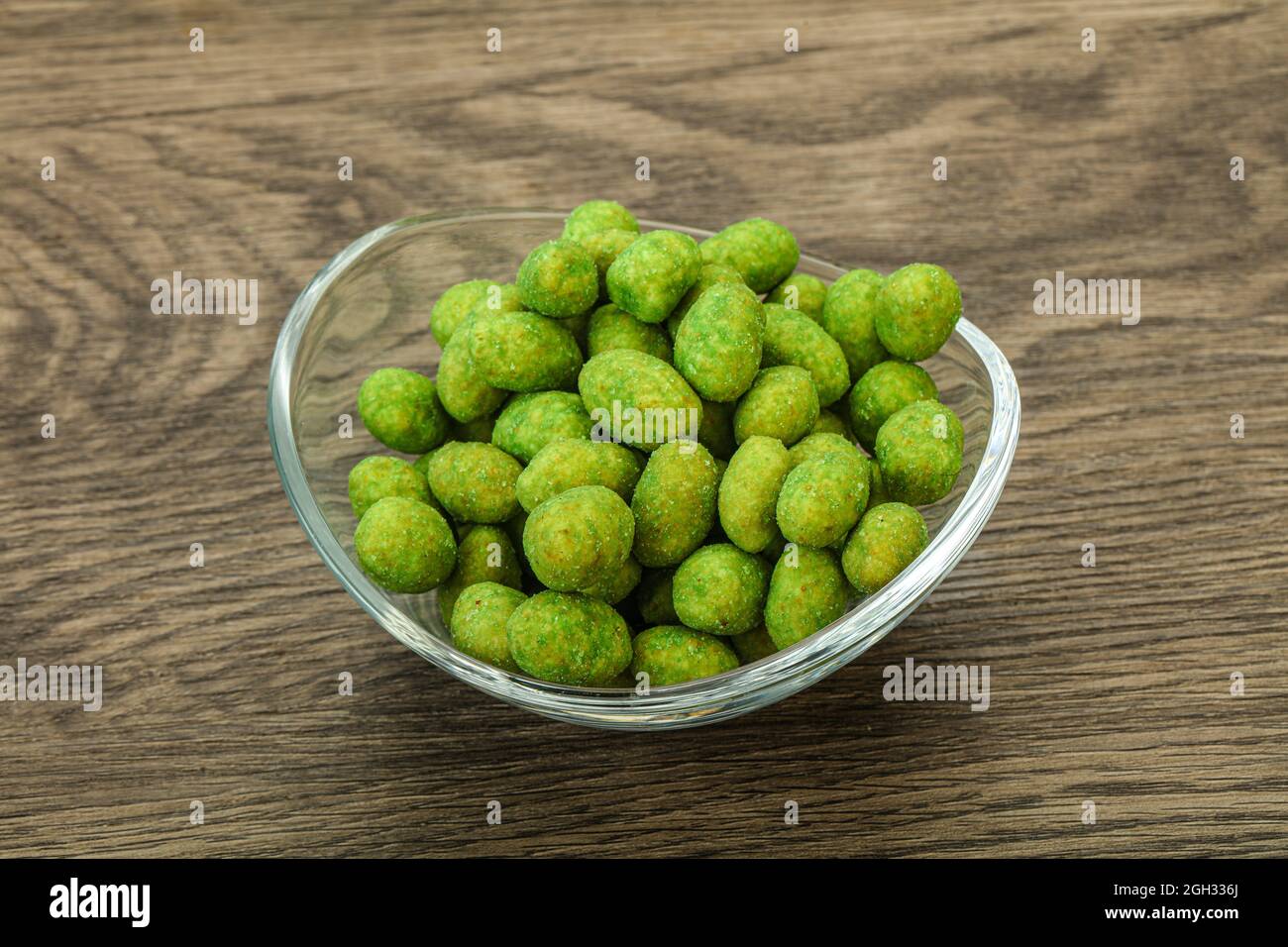Spicy wasabi peanuts snack in the bowl Stock Photo - Alamy