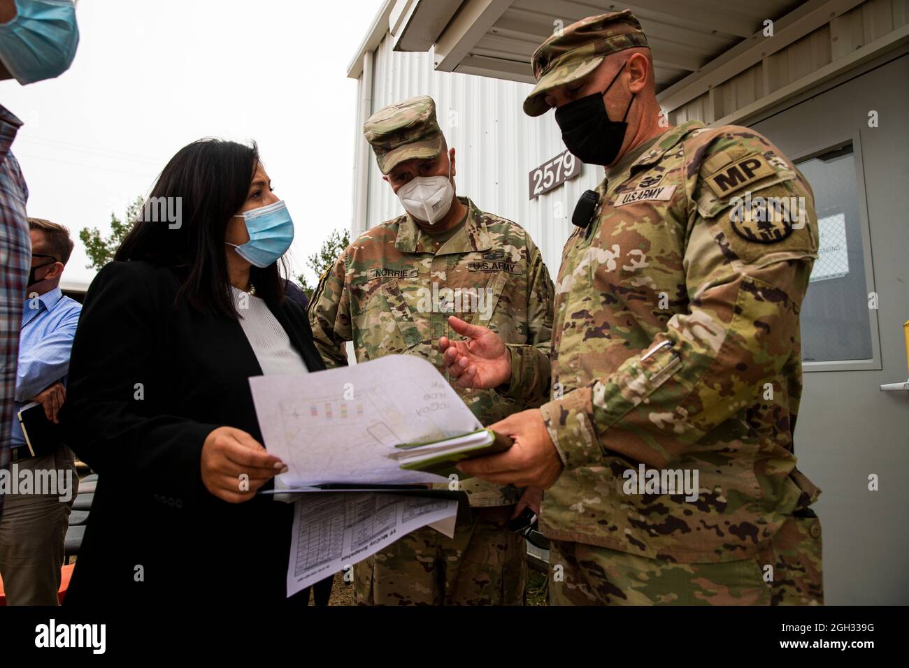Angie Salazar, left, Operation Allies Welcome federal coordinator for ...