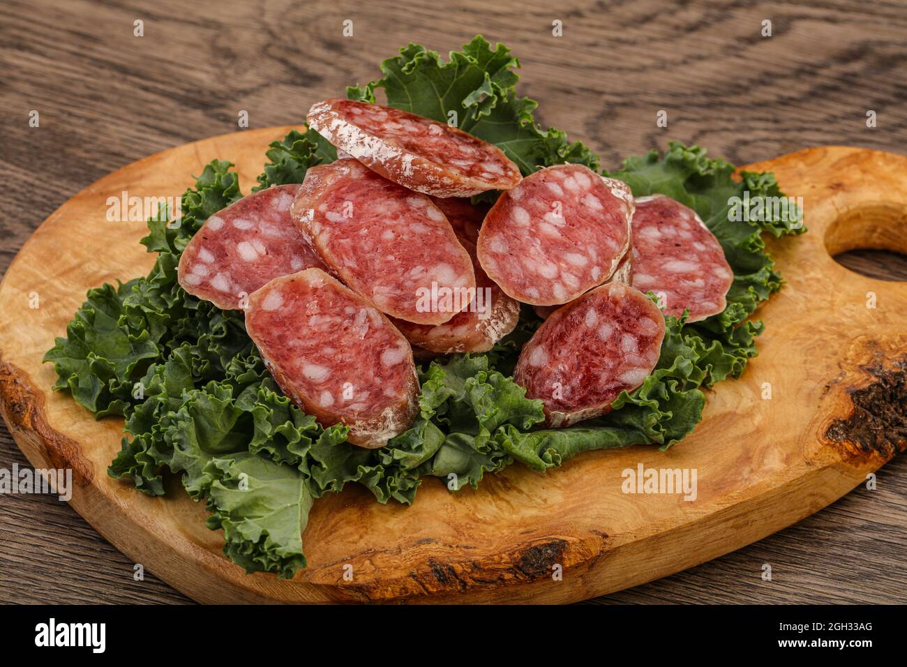 Iberian famous pork Fuet sausage slices Stock Photo - Alamy