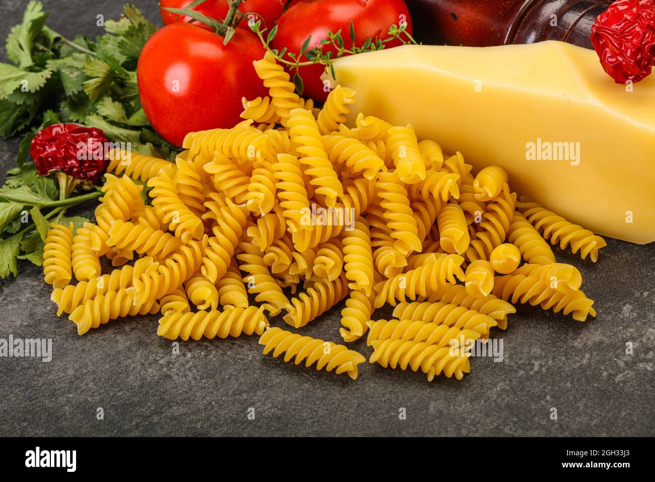 Italian pasta - raw Girandole for cooking served vegetables Stock Photo ...